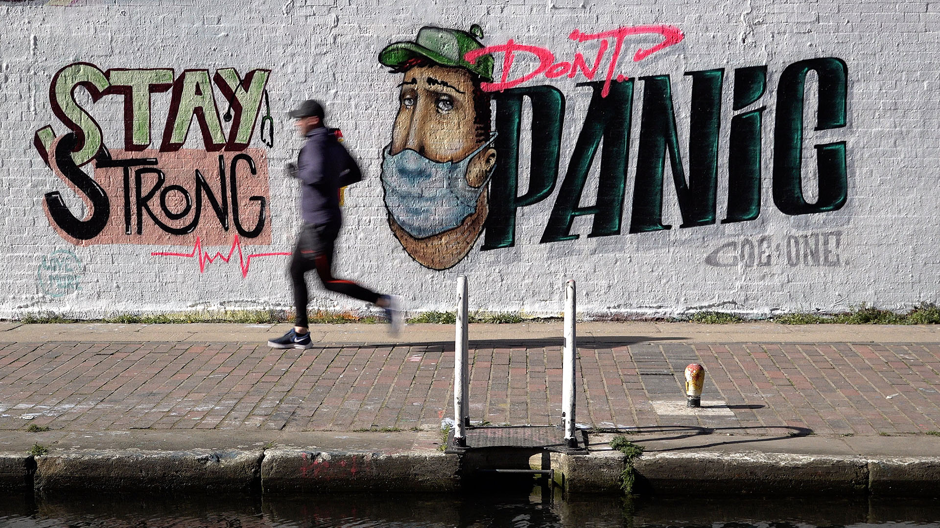 Graffiti Artists Spray Paint “Stay Strong and Don’t Panic” Coronavirus ...